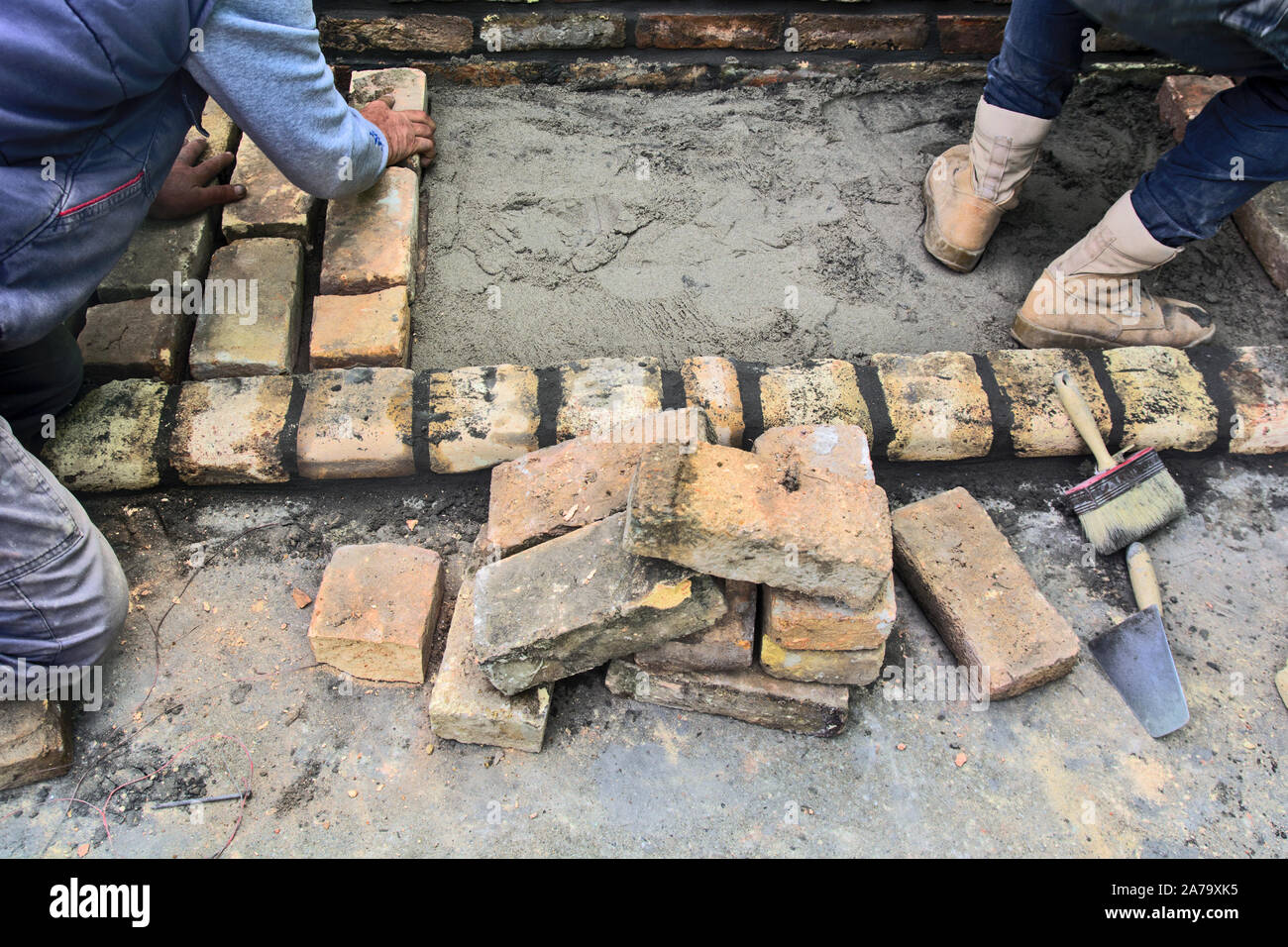 Master masons start masonry and check that it is horizontal Stock Photo ...