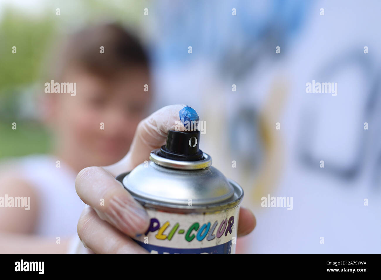 boy with a spray in his hand,graffiti painting Stock Photo - Alamy