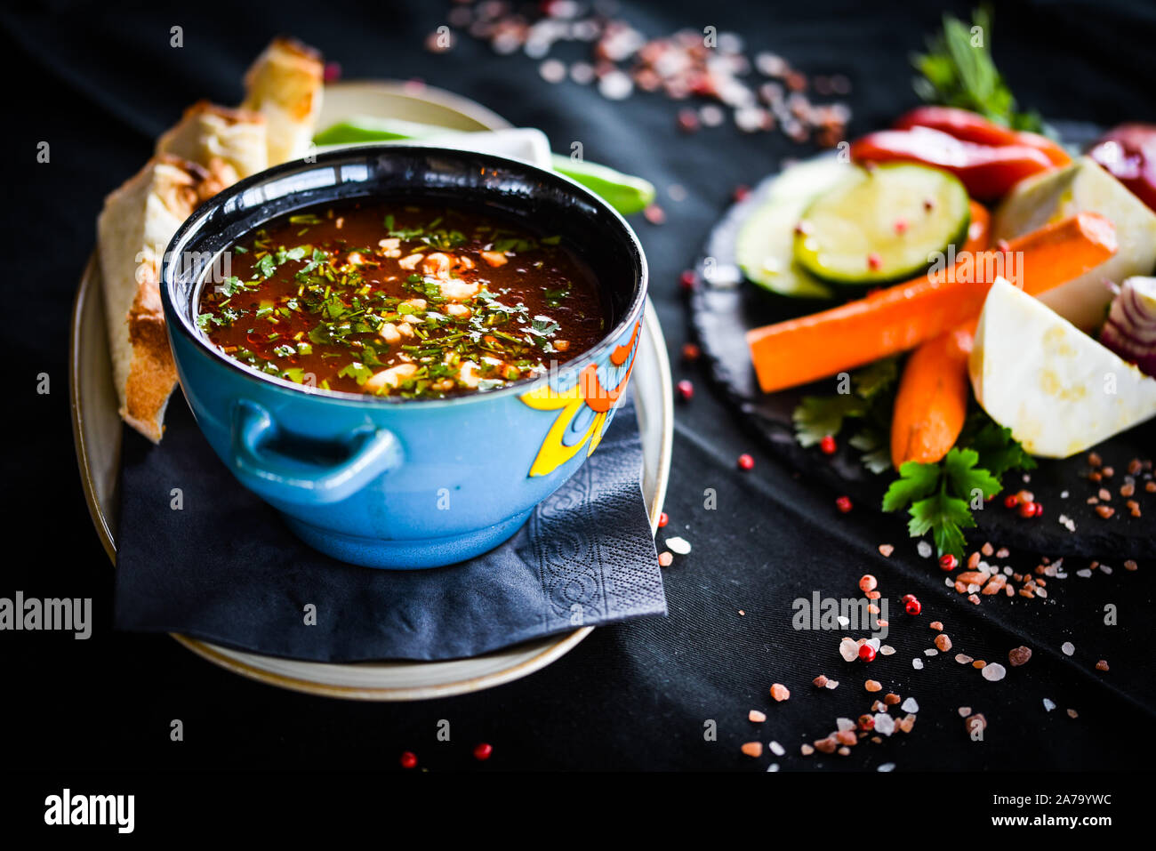 romanian traditional turkey soup with fresh vegetables, wipe cream ...