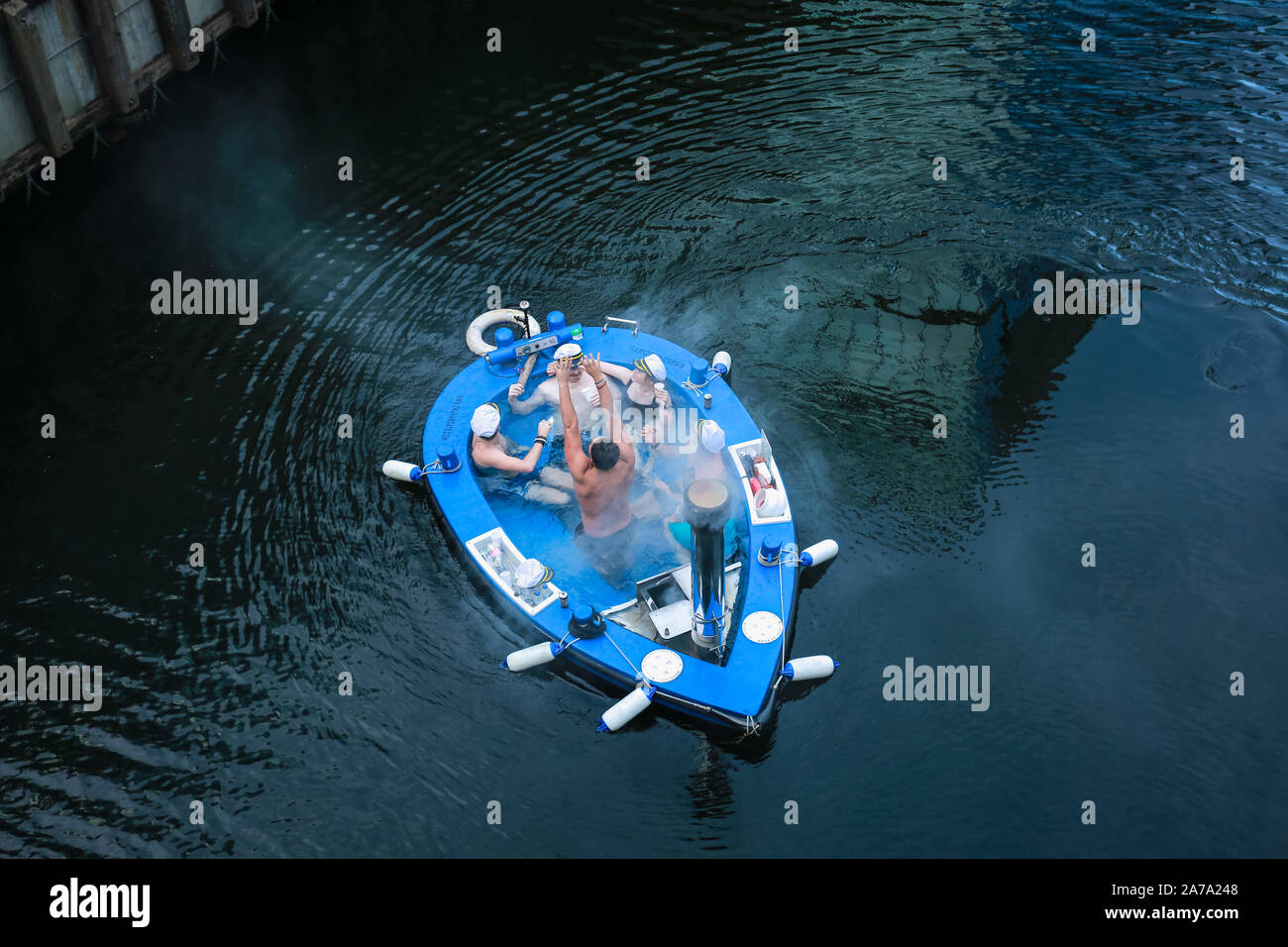 London, UK, 27 October 2019. Hot Tub Boat in the docks of Canary Wharf ...