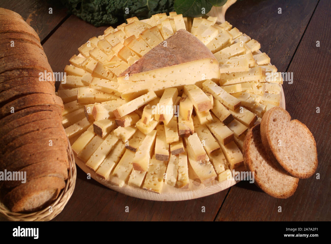 Italian food products Toma alpine cheese of Piedmont Stock Photo - Alamy