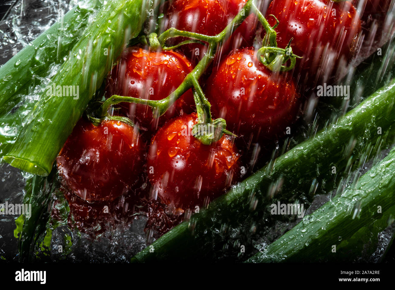 vegetable under flowing water Stock Photo - Alamy