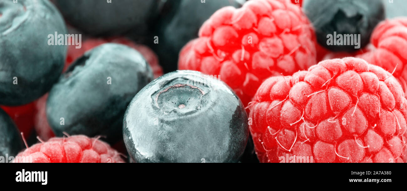 Raspberries and blueberries as background Stock Photo - Alamy