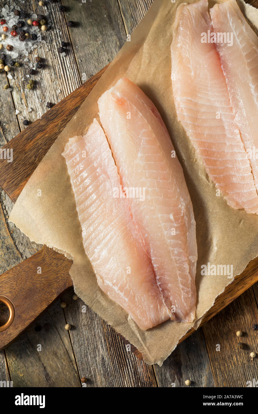 Raw White Organic Tilapia Fish Ready to Cook Stock Photo - Alamy