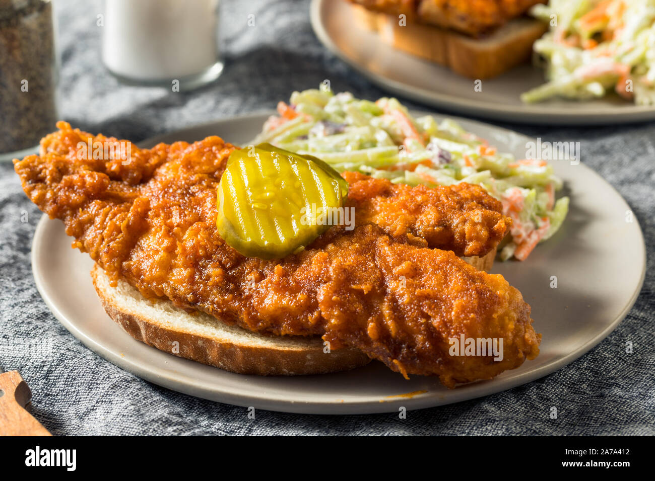 Homemade Nashville Hot Fish with Coleslaw and Bread Stock Photo - Alamy