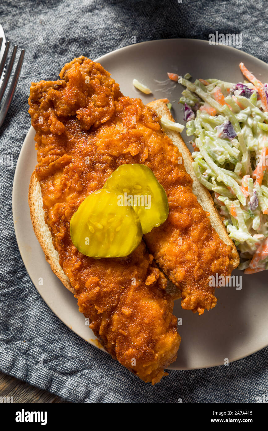 Homemade Nashville Hot Fish with Coleslaw and Bread Stock Photo - Alamy