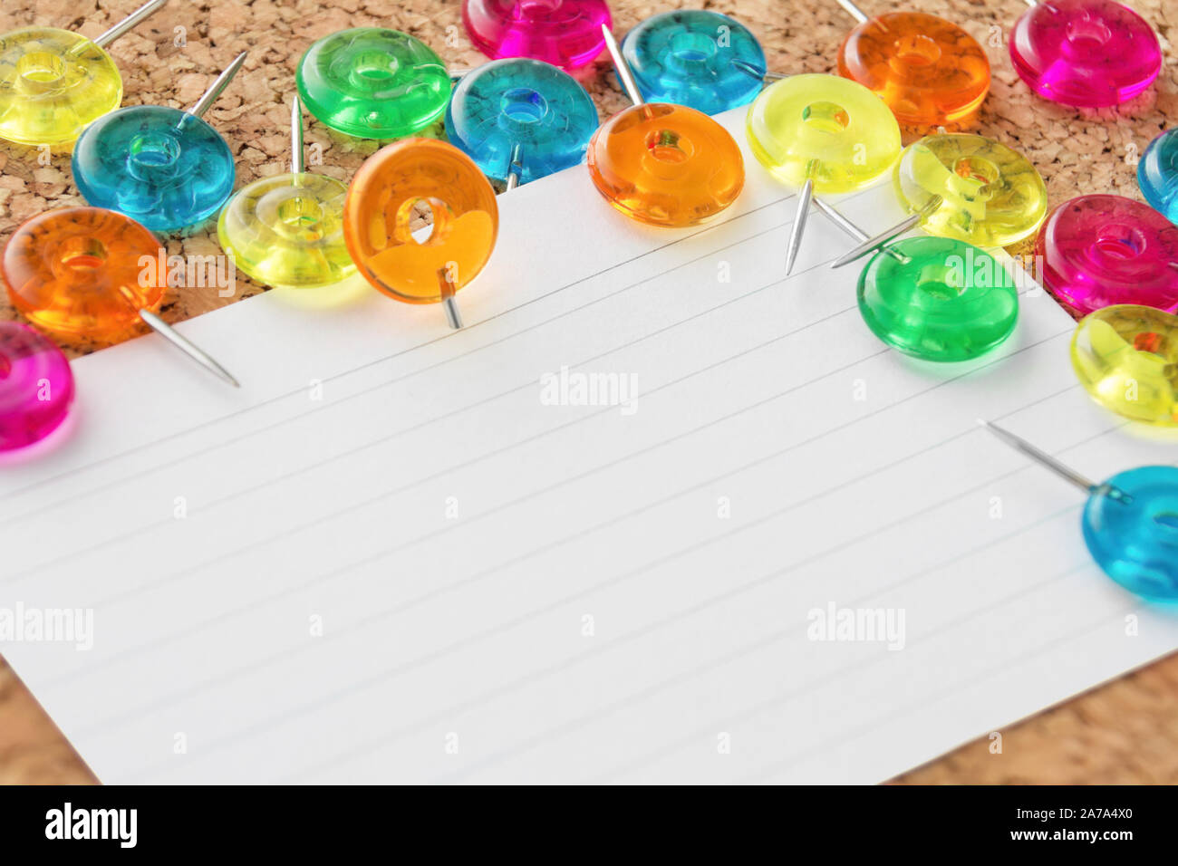 Colorful pin needles with white label Stock Photo - Alamy