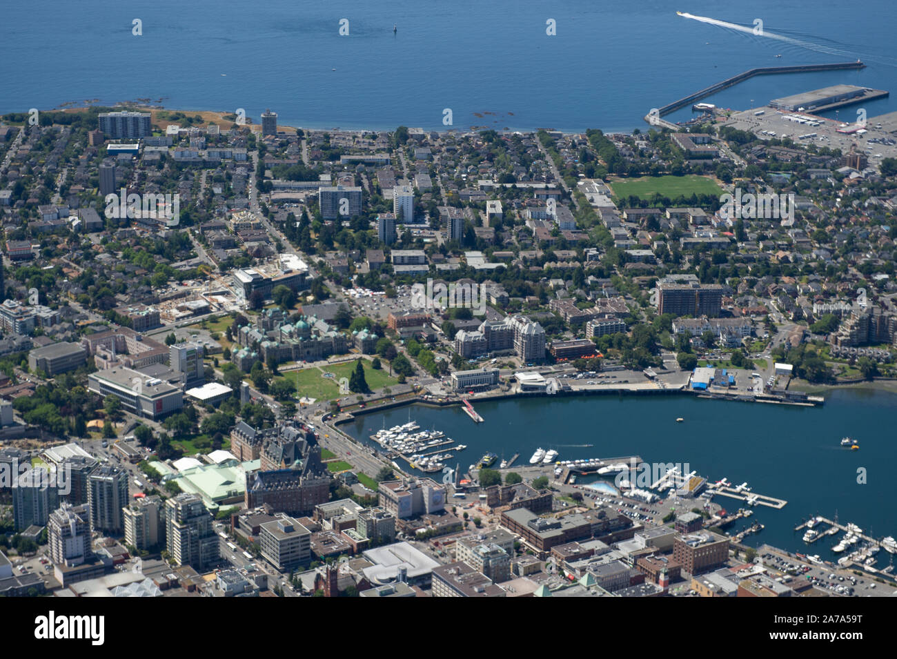 An aerial view of the park filled city of Victoria, British Columbia ...