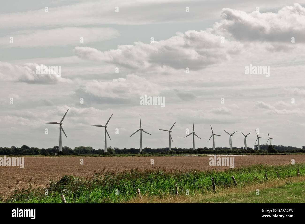 Typical landscape of northern Germany. Wind turbines wind energy ...