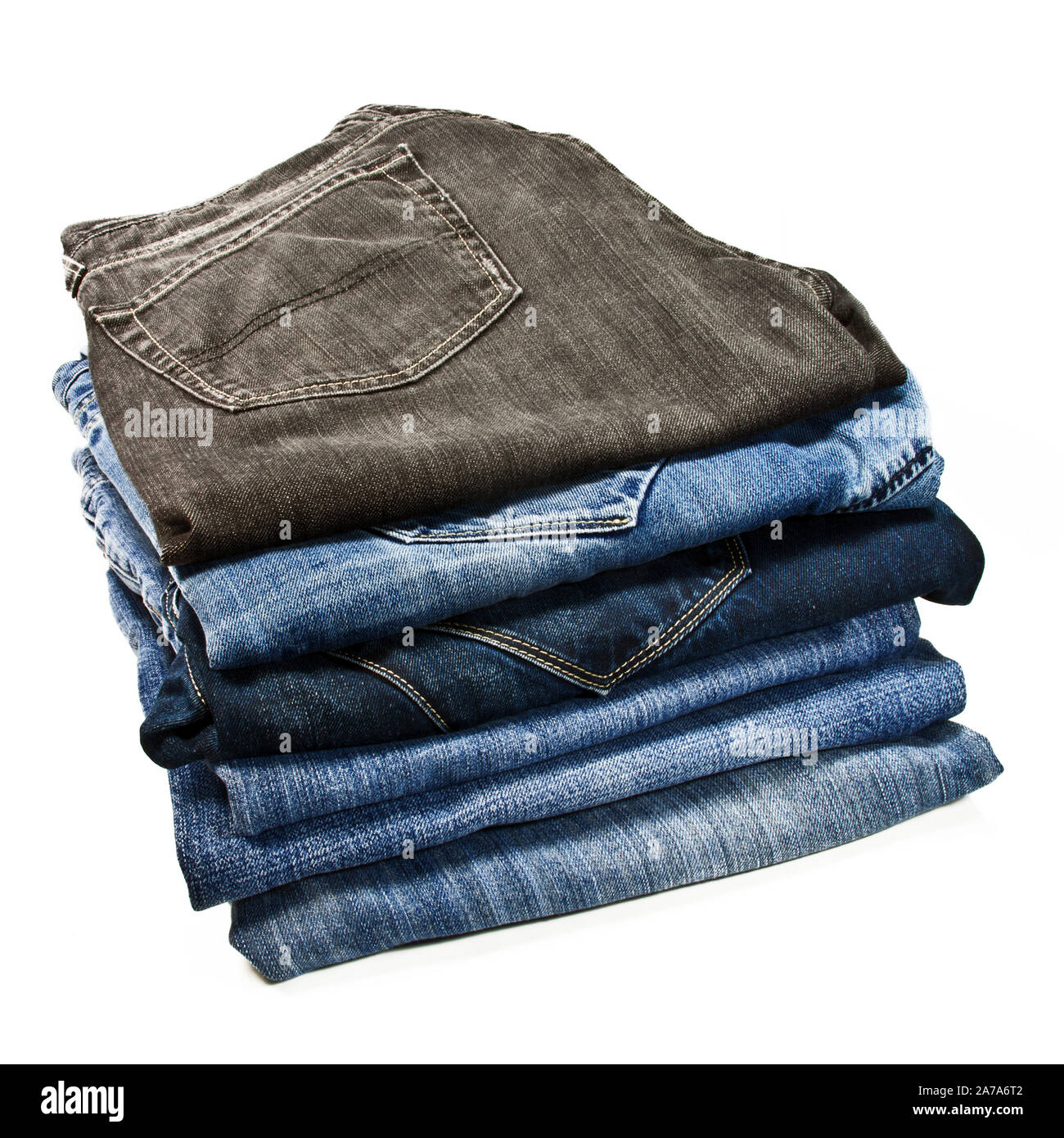 Stack of jeans isolated on white background Stock Photo - Alamy