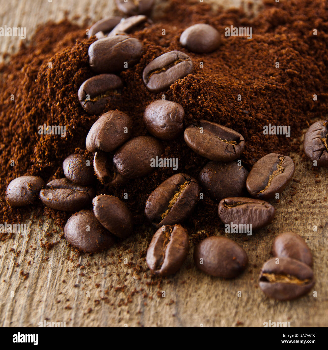 Coffee beans and coffee powder as background Stock Photo - Alamy