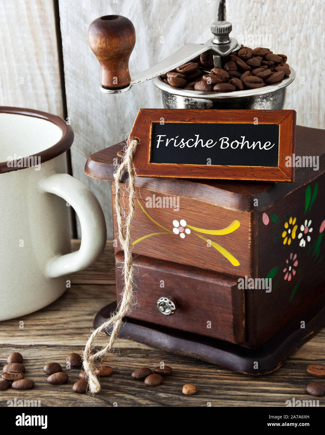 German Fresh beans Coffee grinder with coffee beans and label Stock ...