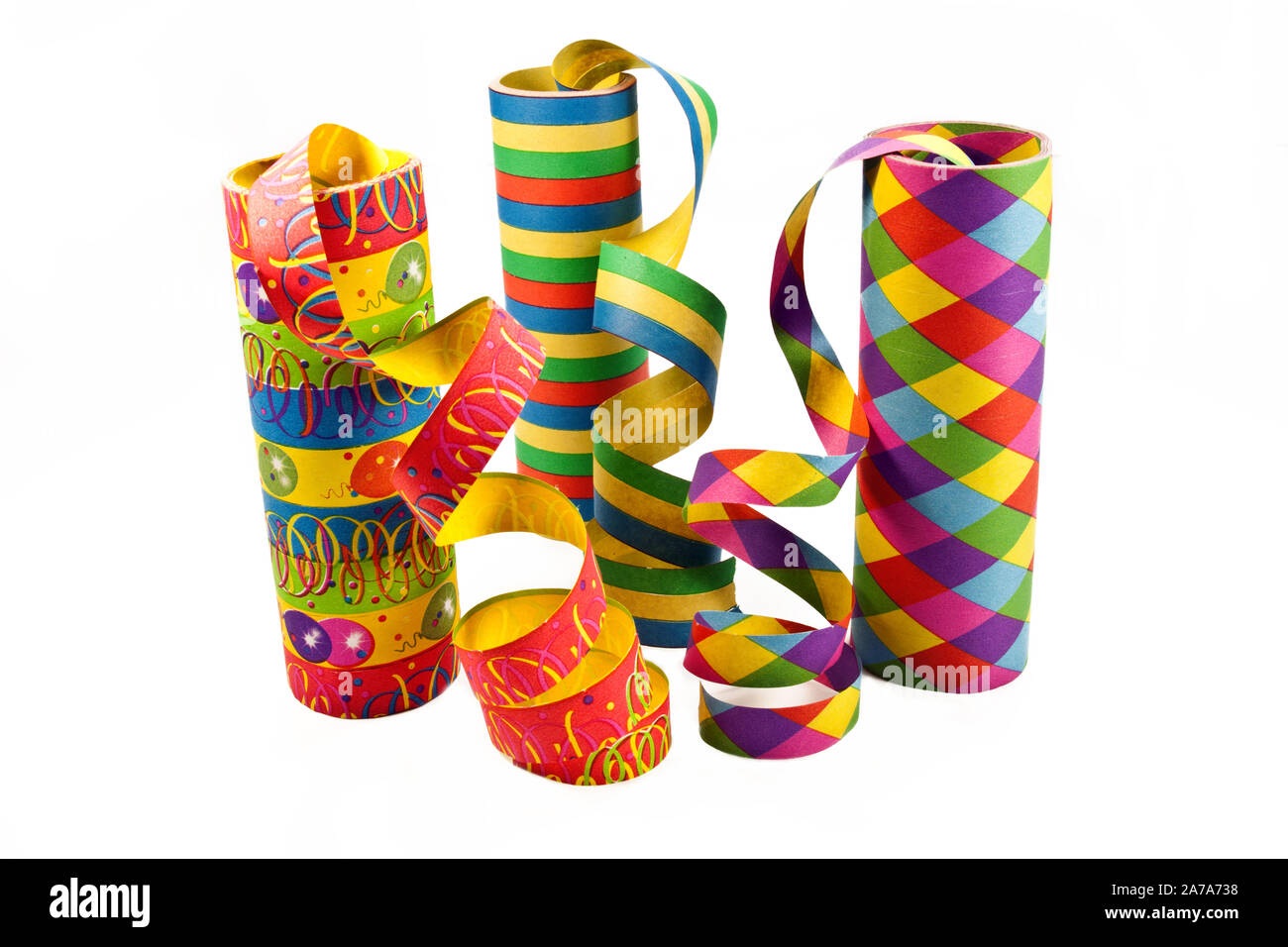 Colourful streamers on a white background Stock Photo - Alamy