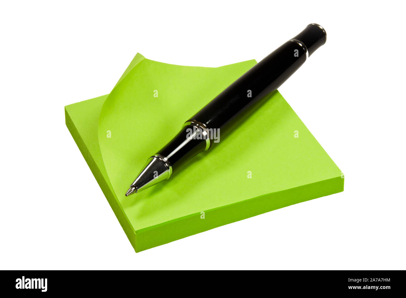 Memo Block with ballpoint pen on white background Stock Photo - Alamy