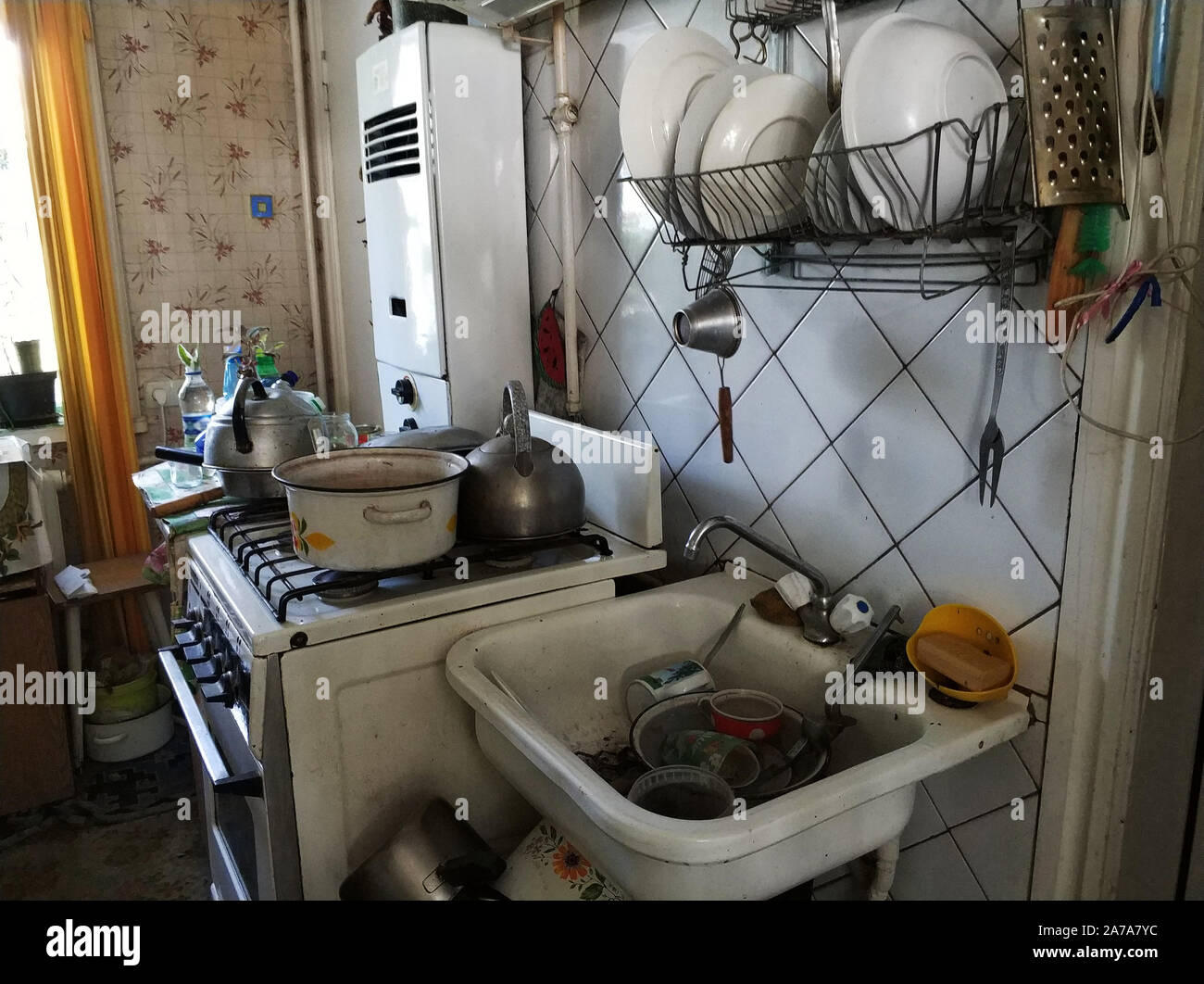 mess and dump. An old room with lots of things. Devastation. Very small ...