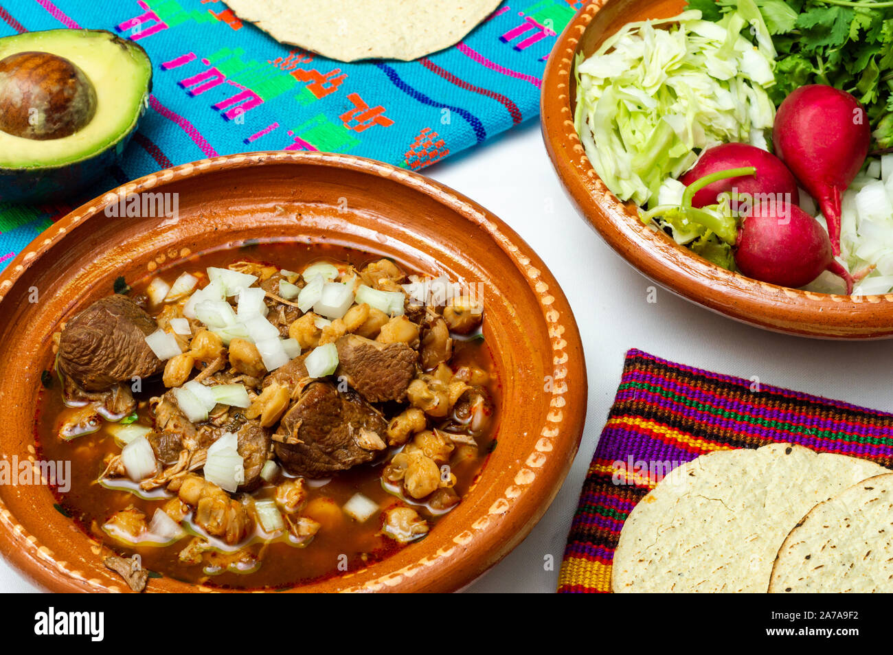Red pozole, a traditional Mexican stew made with pork and hominy corn ...