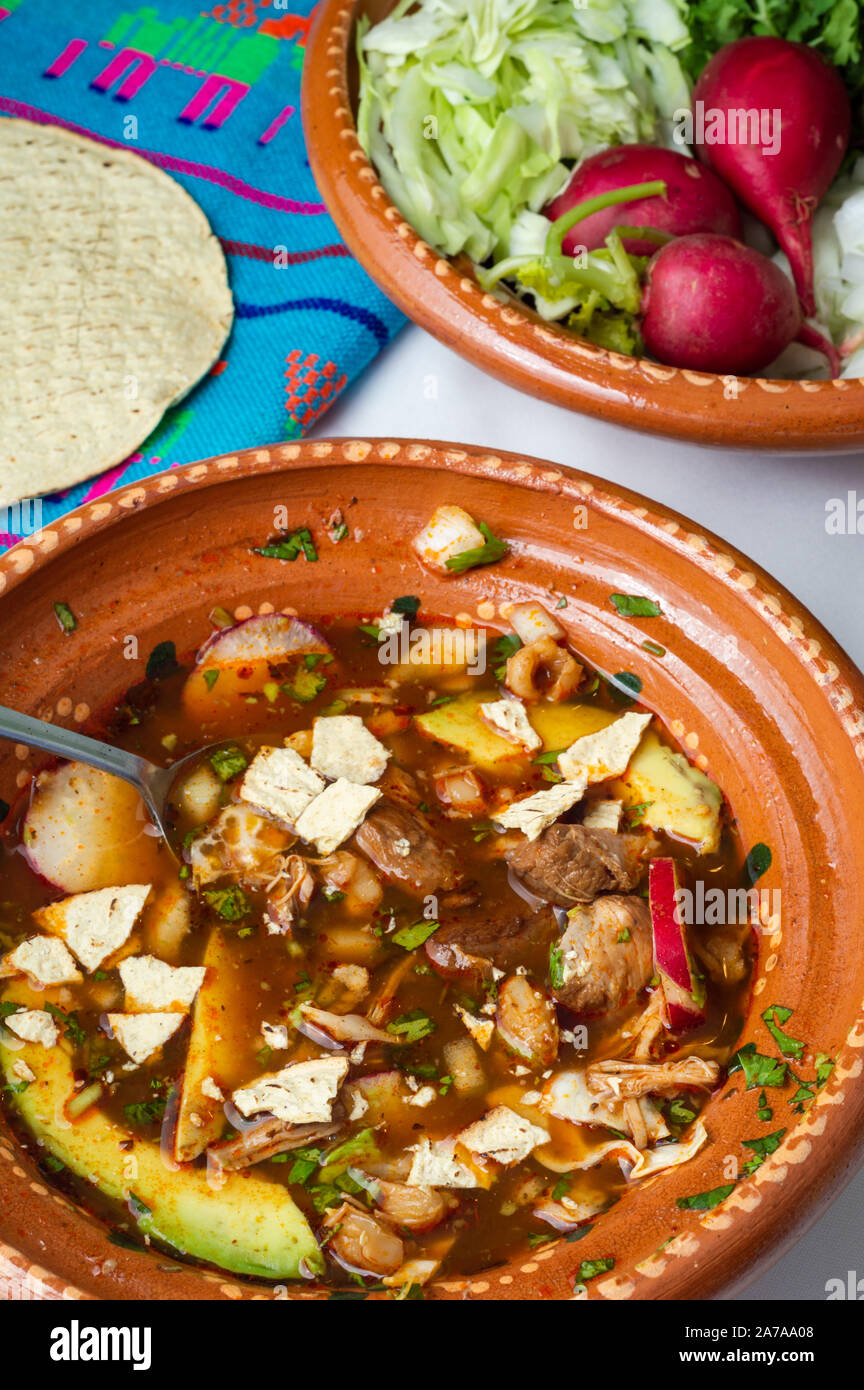 Red pozole, a traditional Mexican stew made with pork and hominy corn ...