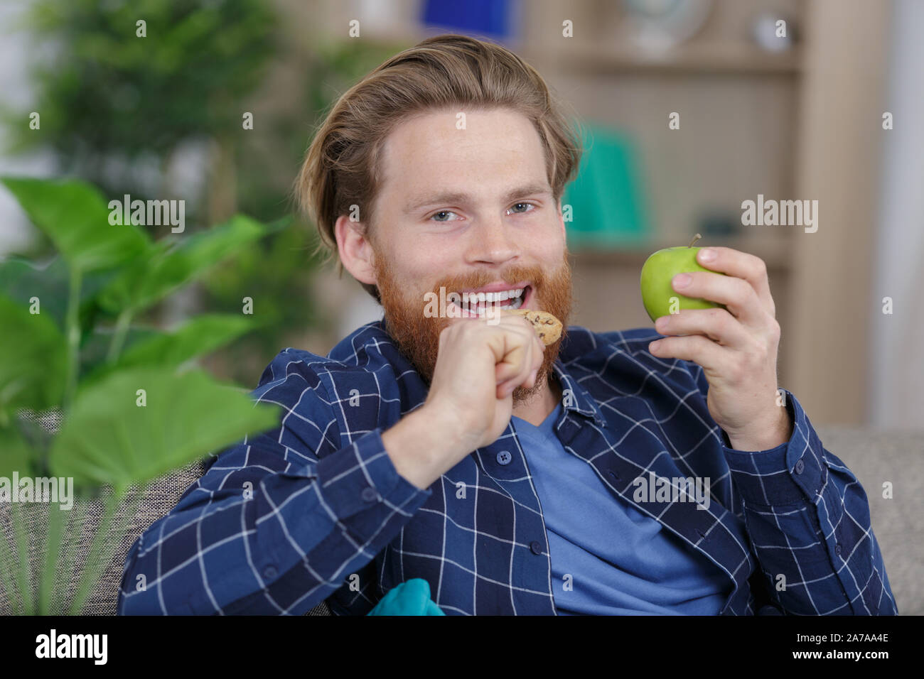 Man eating biscuit hi-res stock photography and images - Alamy