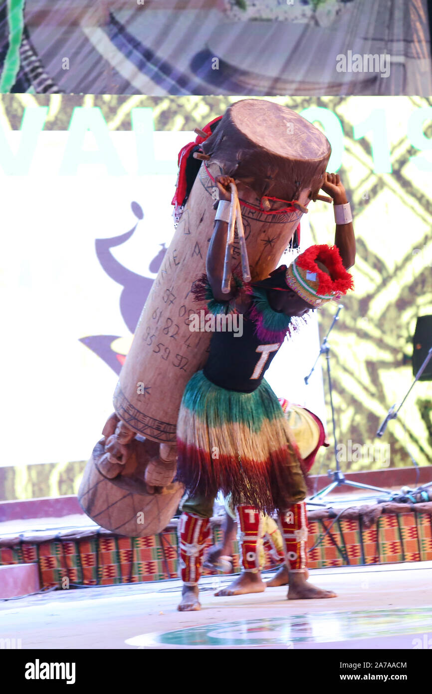 Young African Drummer carrying his drum during the African Drum ...