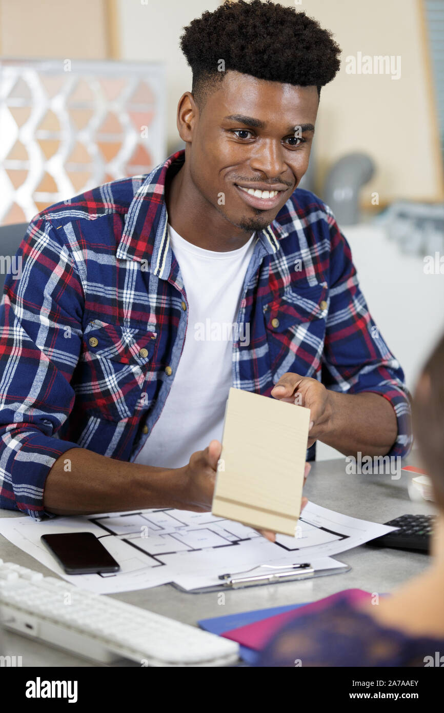 man with color swatches in hand Stock Photo - Alamy