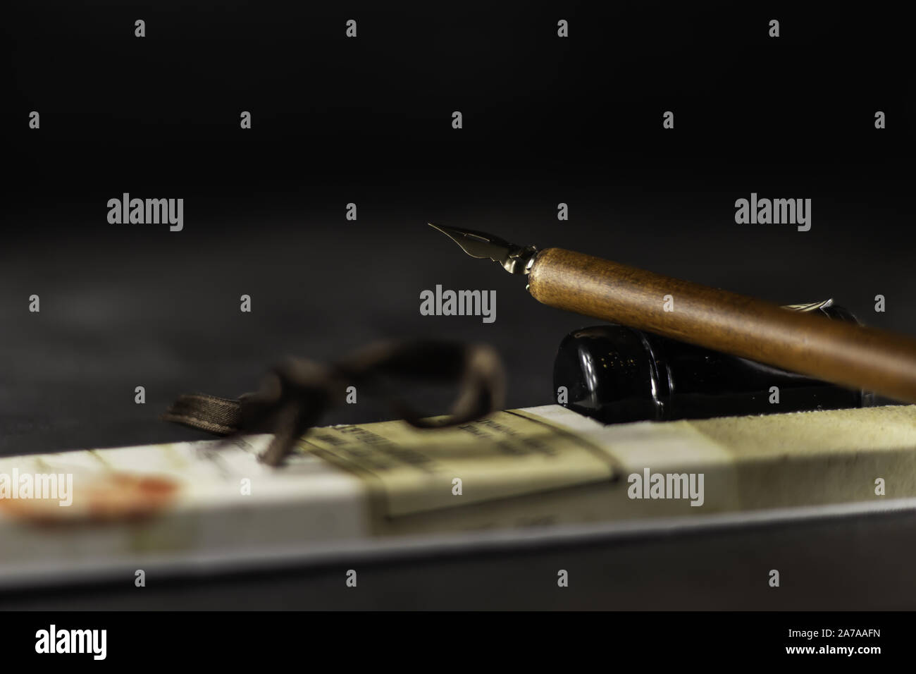 Old style pen with black ink Stock Photo - Alamy