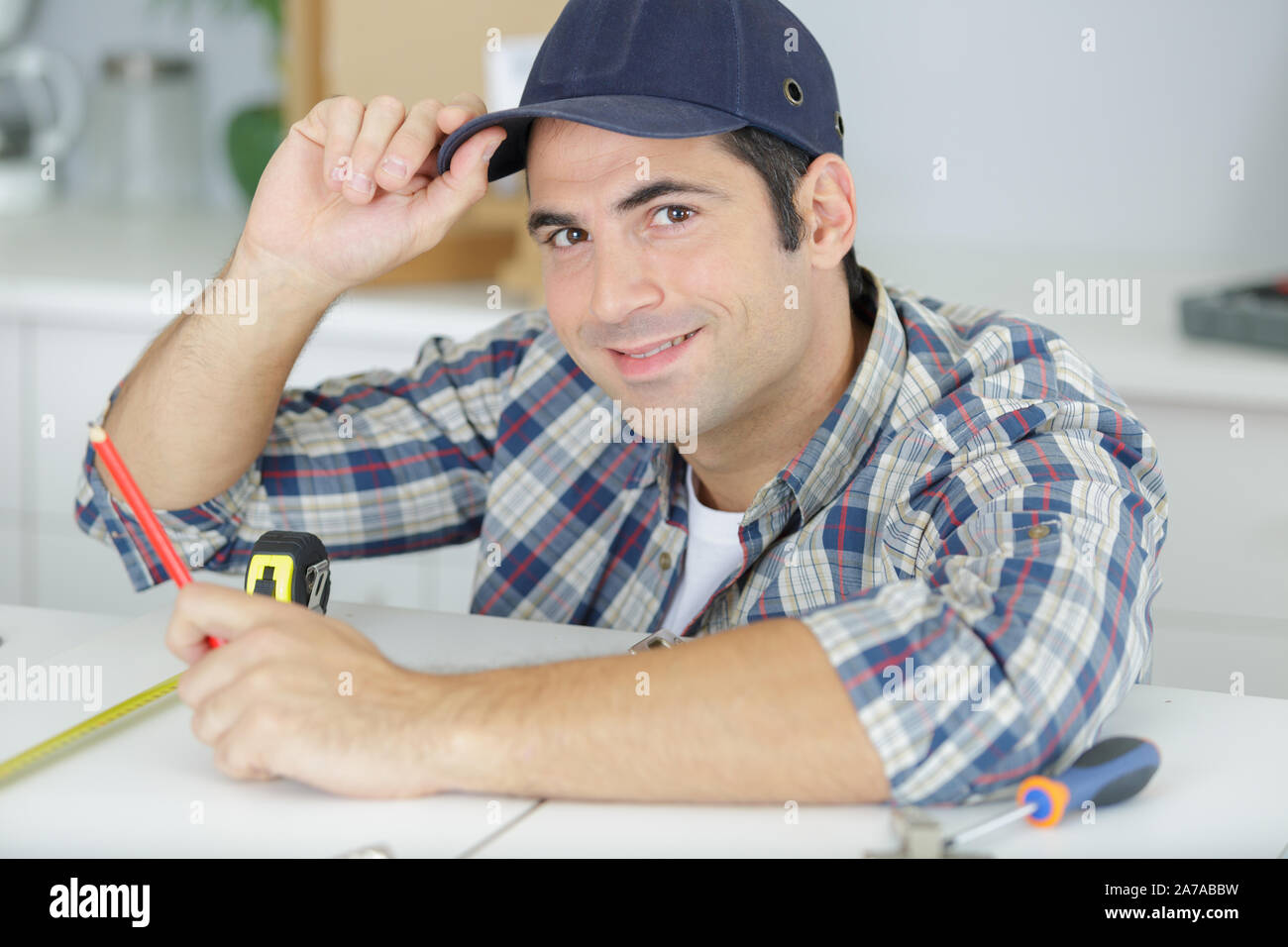 Fitting work clothes hi-res stock photography and images - Alamy