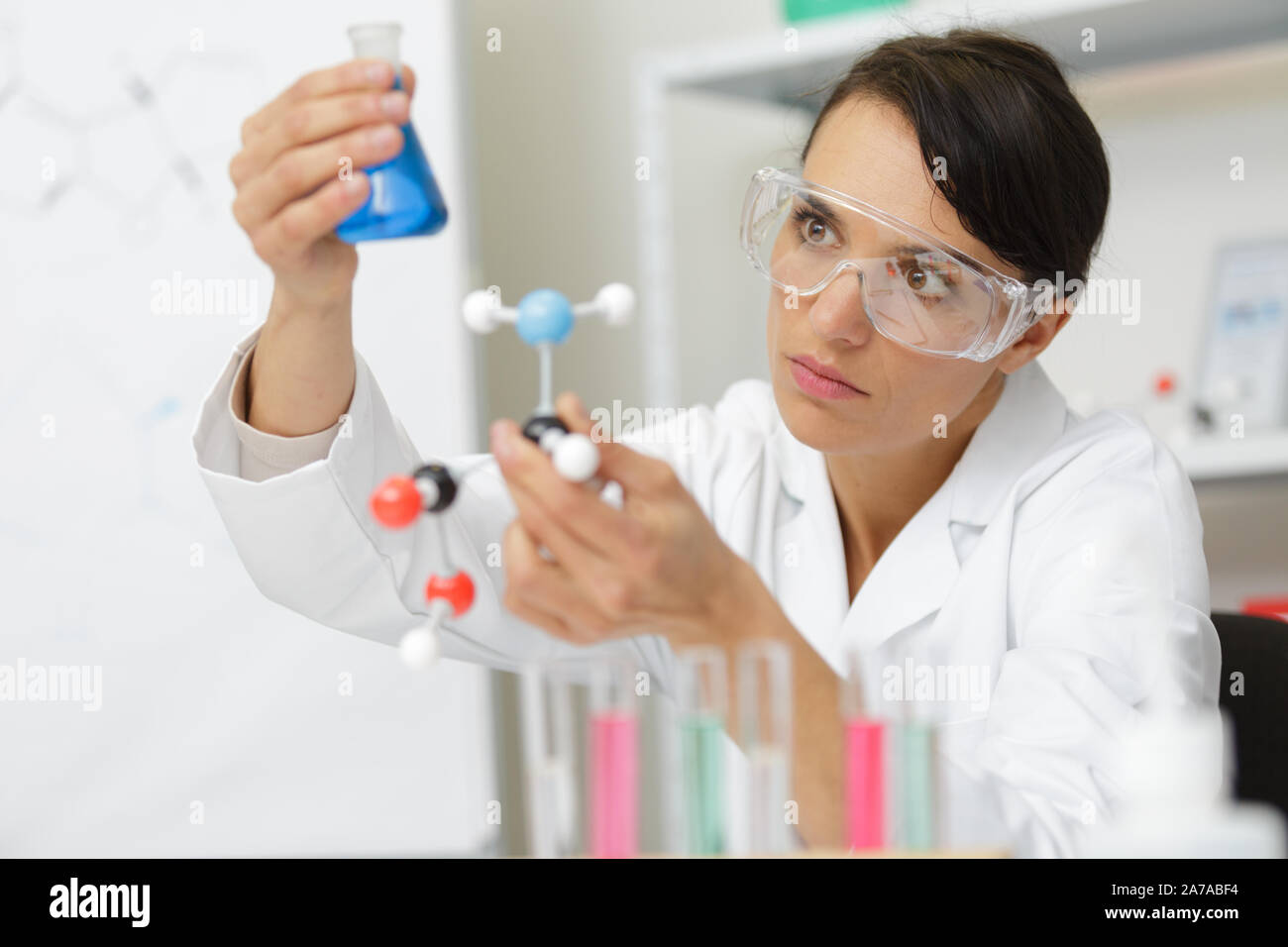 young woman lab assistant in a genetics lab Stock Photo - Alamy