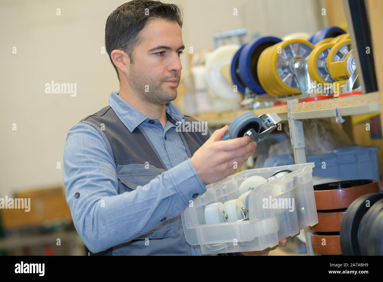 portrait of man working on gear mechanism design Stock Photo - Alamy