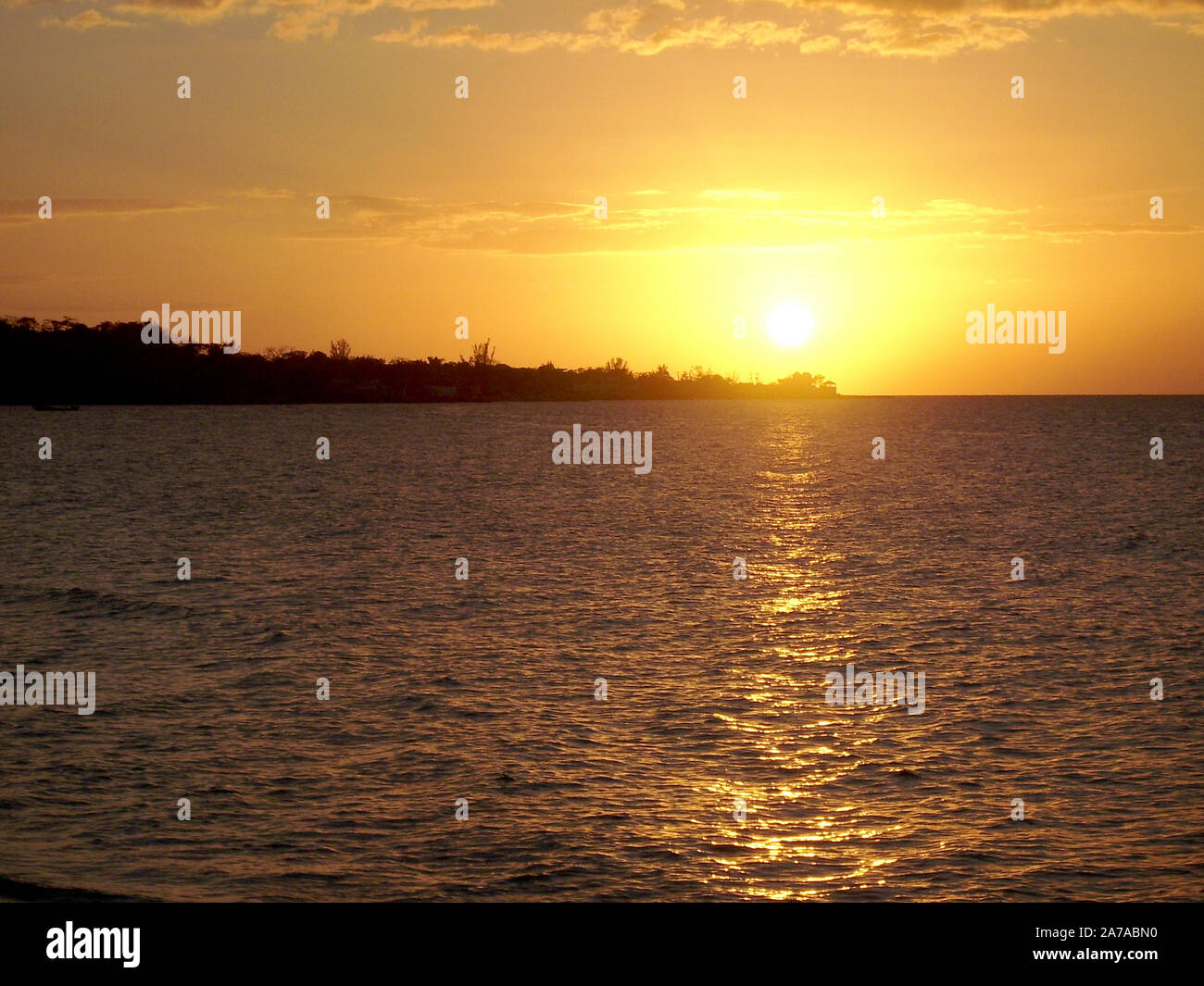 sight of a golden sunset in the Caribbean, Jamaica Stock Photo - Alamy