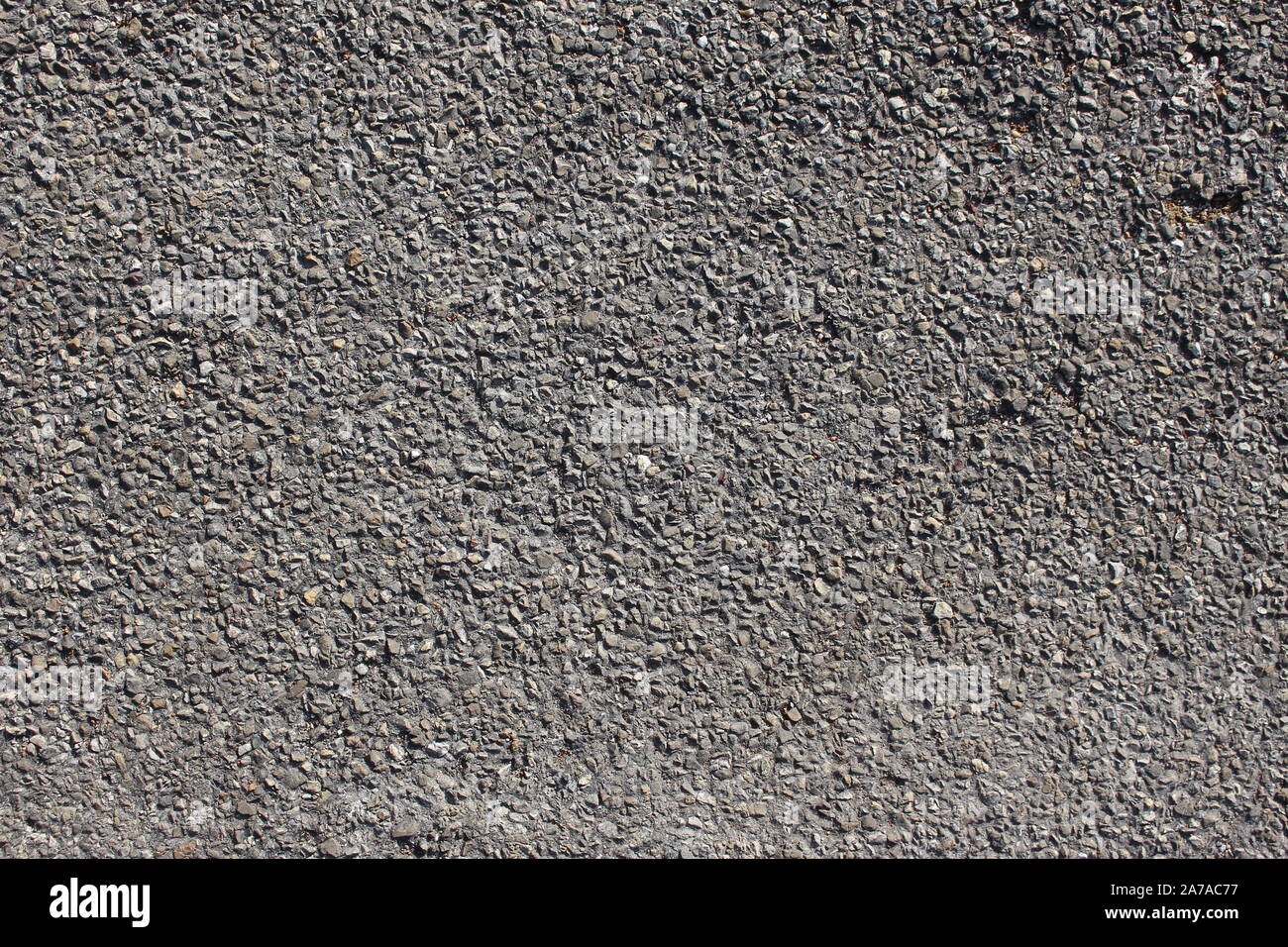 Rough road pavement texture background or wallpaper Stock Photo - Alamy