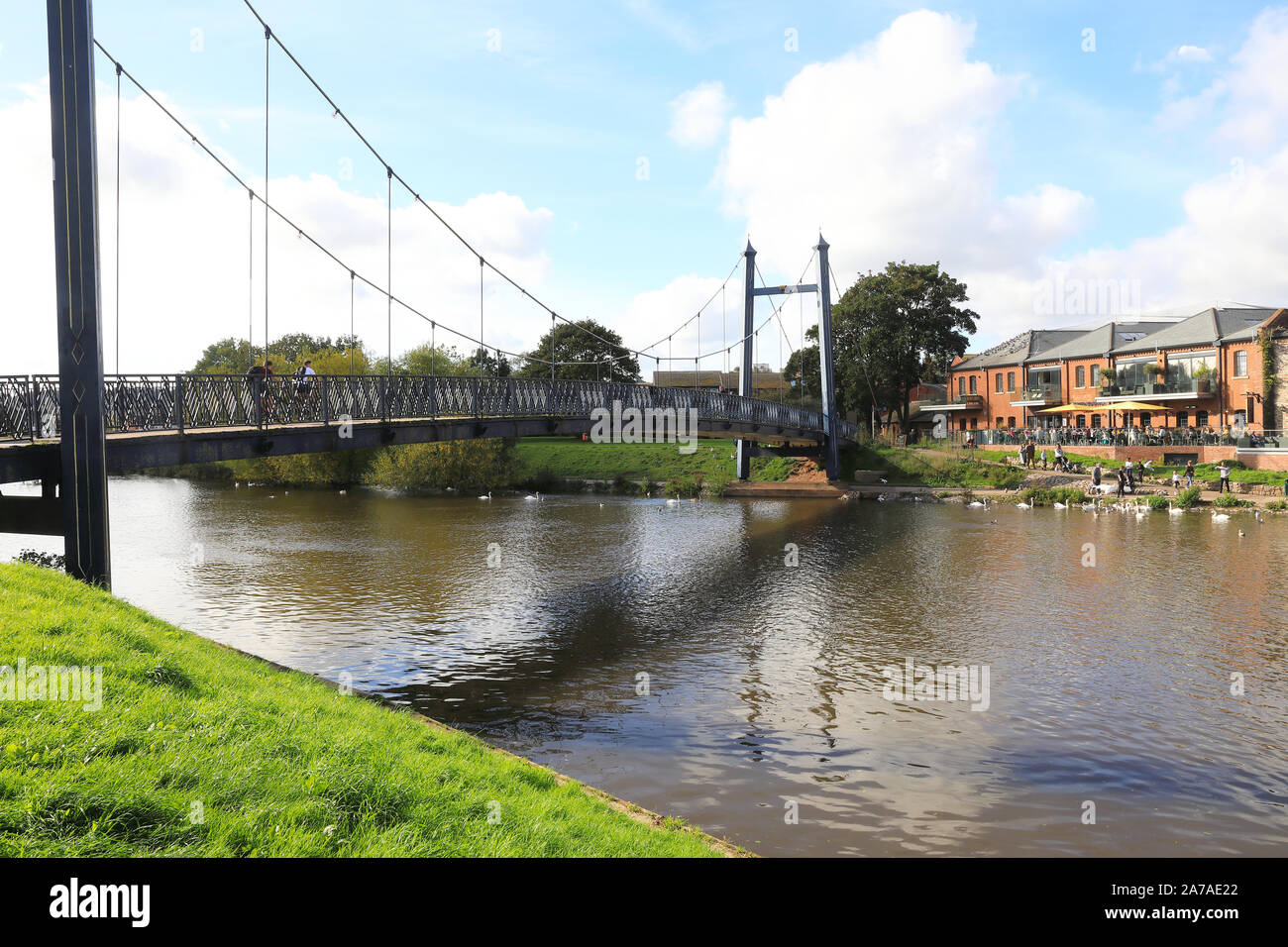 Autumn sunshine on Cricklepit Bridge over the River Exe, next to the ...