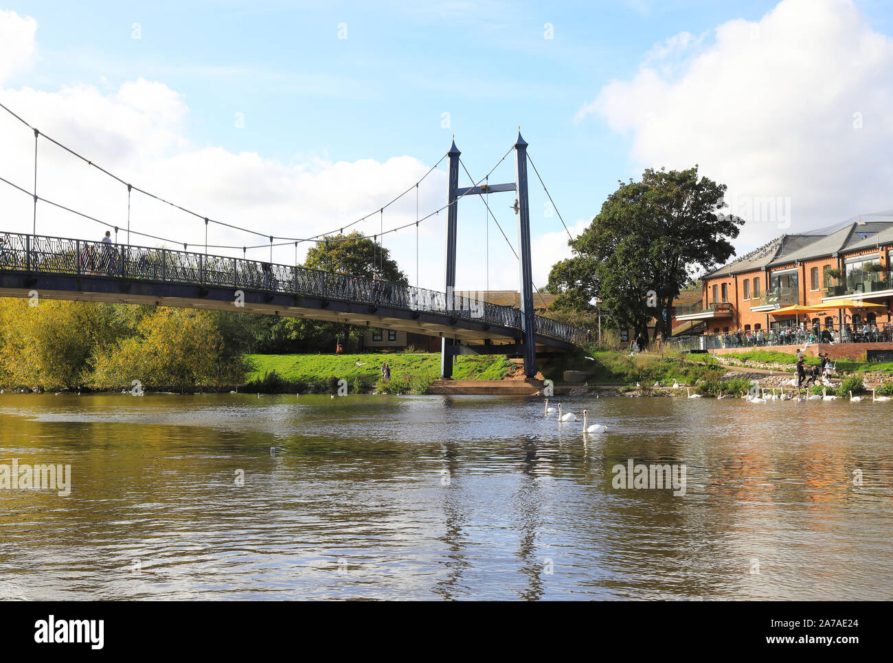 Autumn sunshine on Cricklepit Bridge over the River Exe, next to the ...