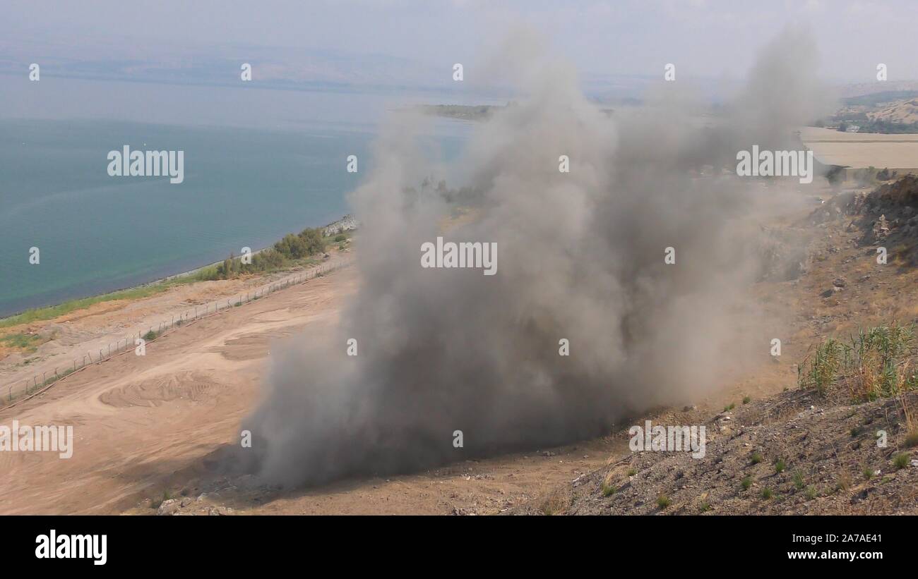 Enginers of 4M defense with protective gear inspecting an old Syrian ...