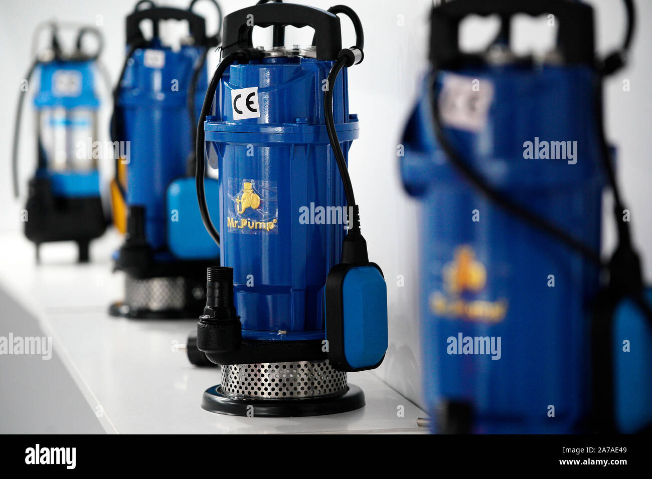 Submersible water pumps are seen on display at the China Brand Show in ...