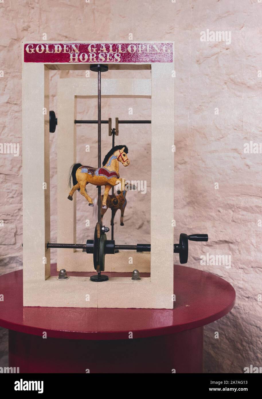 Childrens learning toy showing them how fairground carousel horses work ...