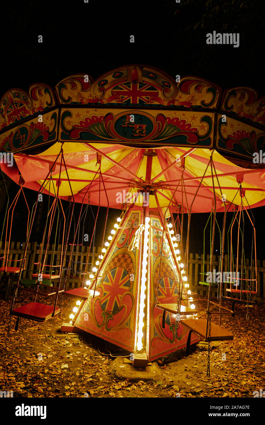 Stationary children's steam powered 'swinging chairs' fairground ride ...