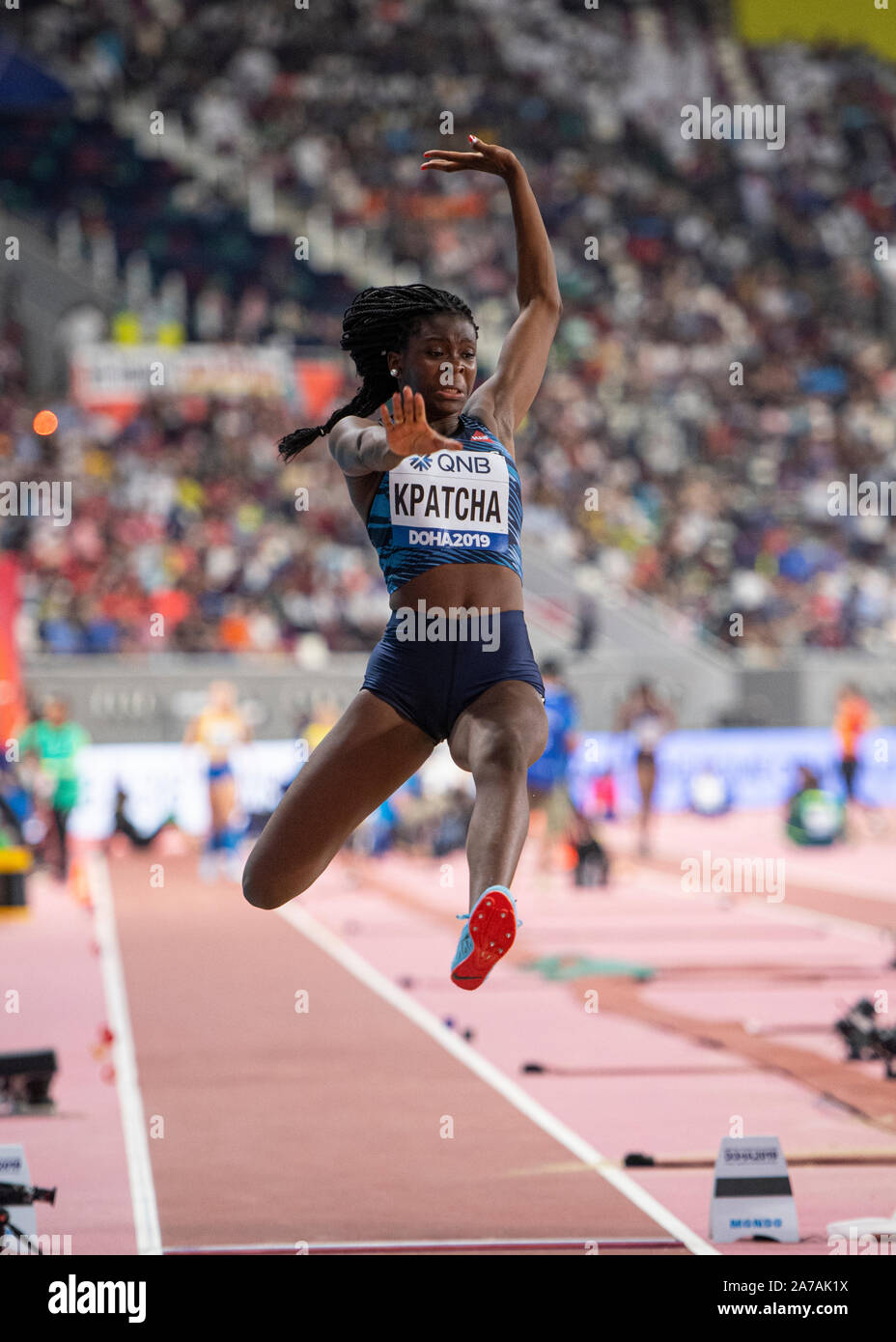 DOHA - QATAR OCT 5: Hilary Kptcha of France competing in the Long Jump ...
