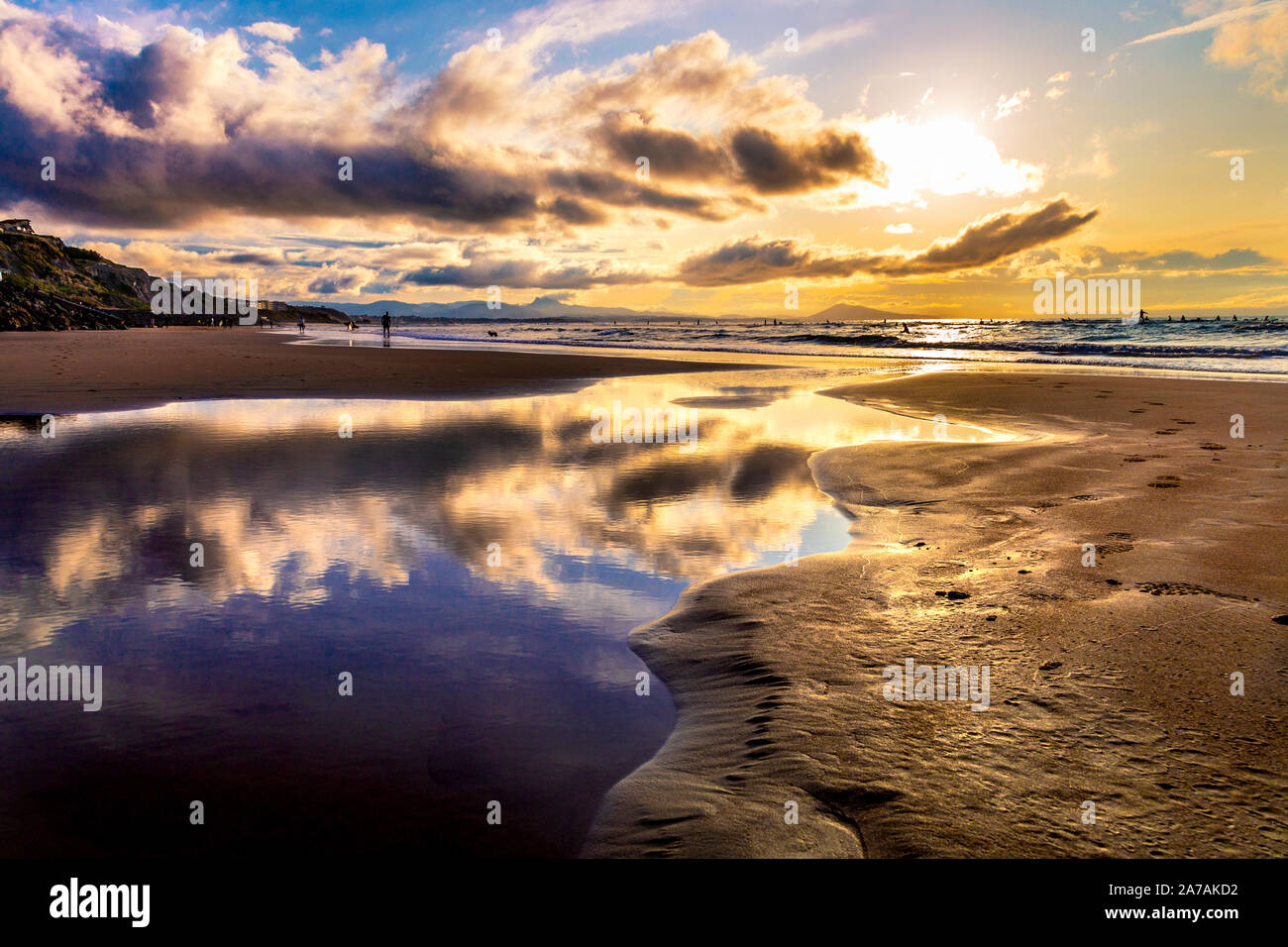 Surfing beach Côte des Basques at sunset in Biarritz, France Stock ...