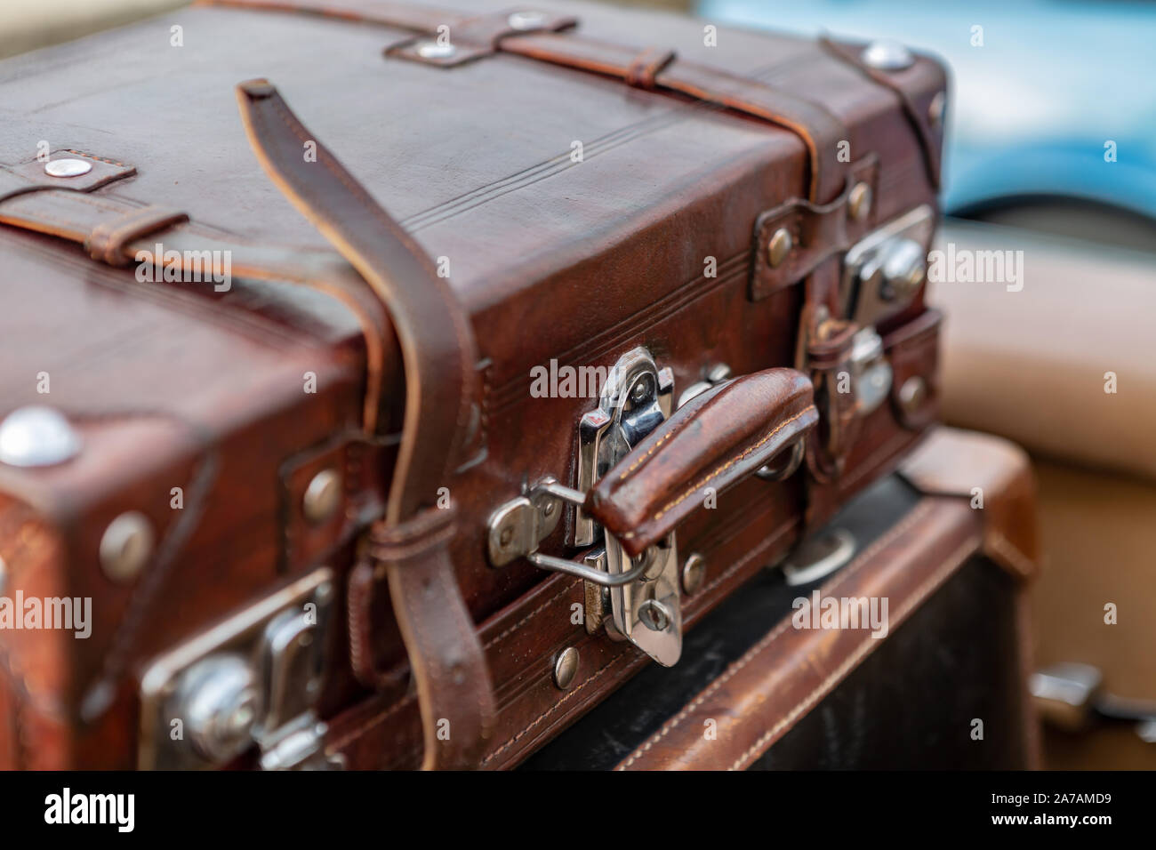 Macro view of Vintage leather suitcase with chrome clasps Stock Photo ...