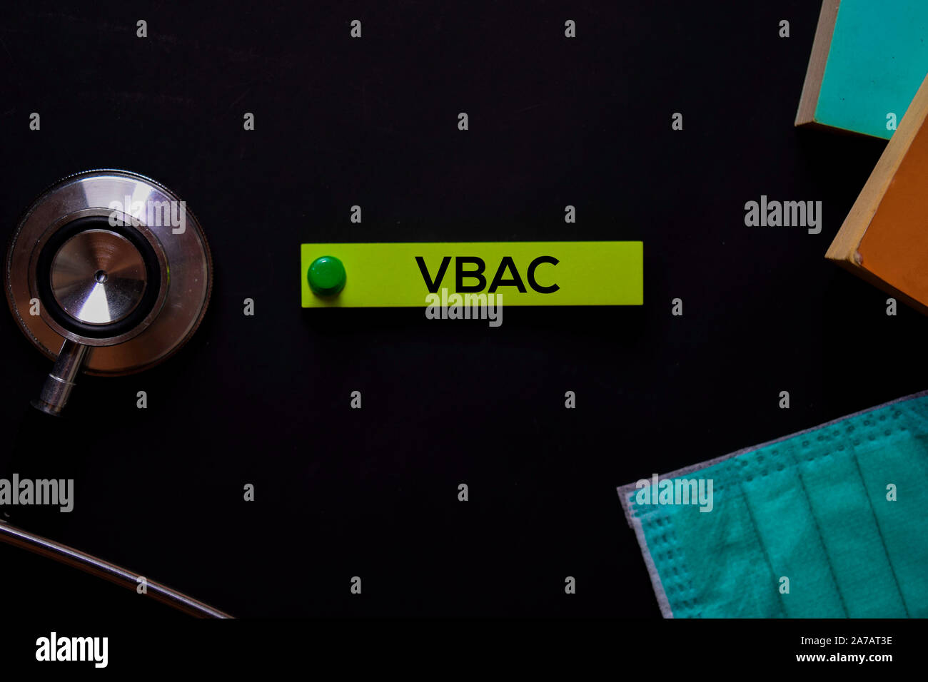 VBAC text on sticky notes. Office desk background. Medical or ...