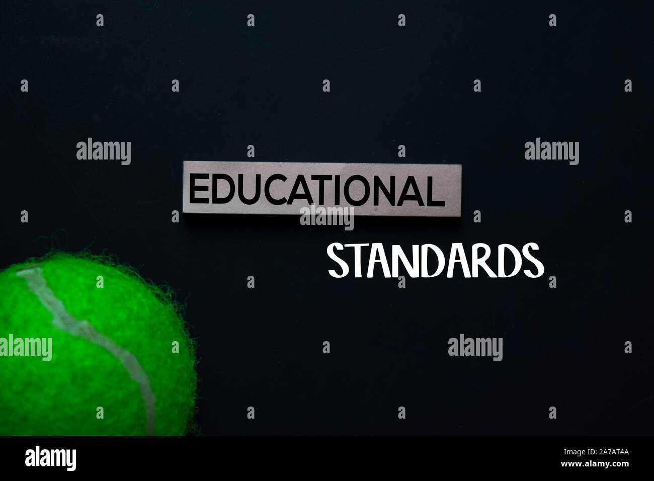 Educational Standards text on sticky notes. Office desk background ...