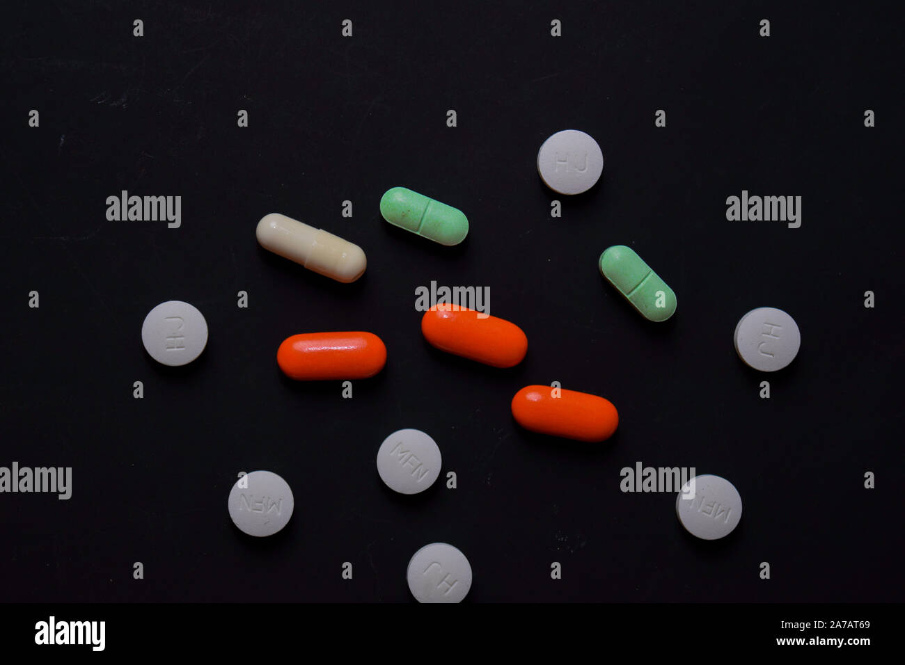 colorful medication and medicine pills, tablets and capsules. Isolated ...