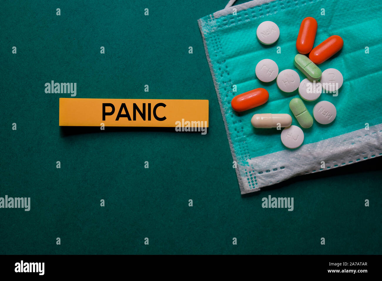 Panic text on sticky notes. Office desk background. Medical or ...