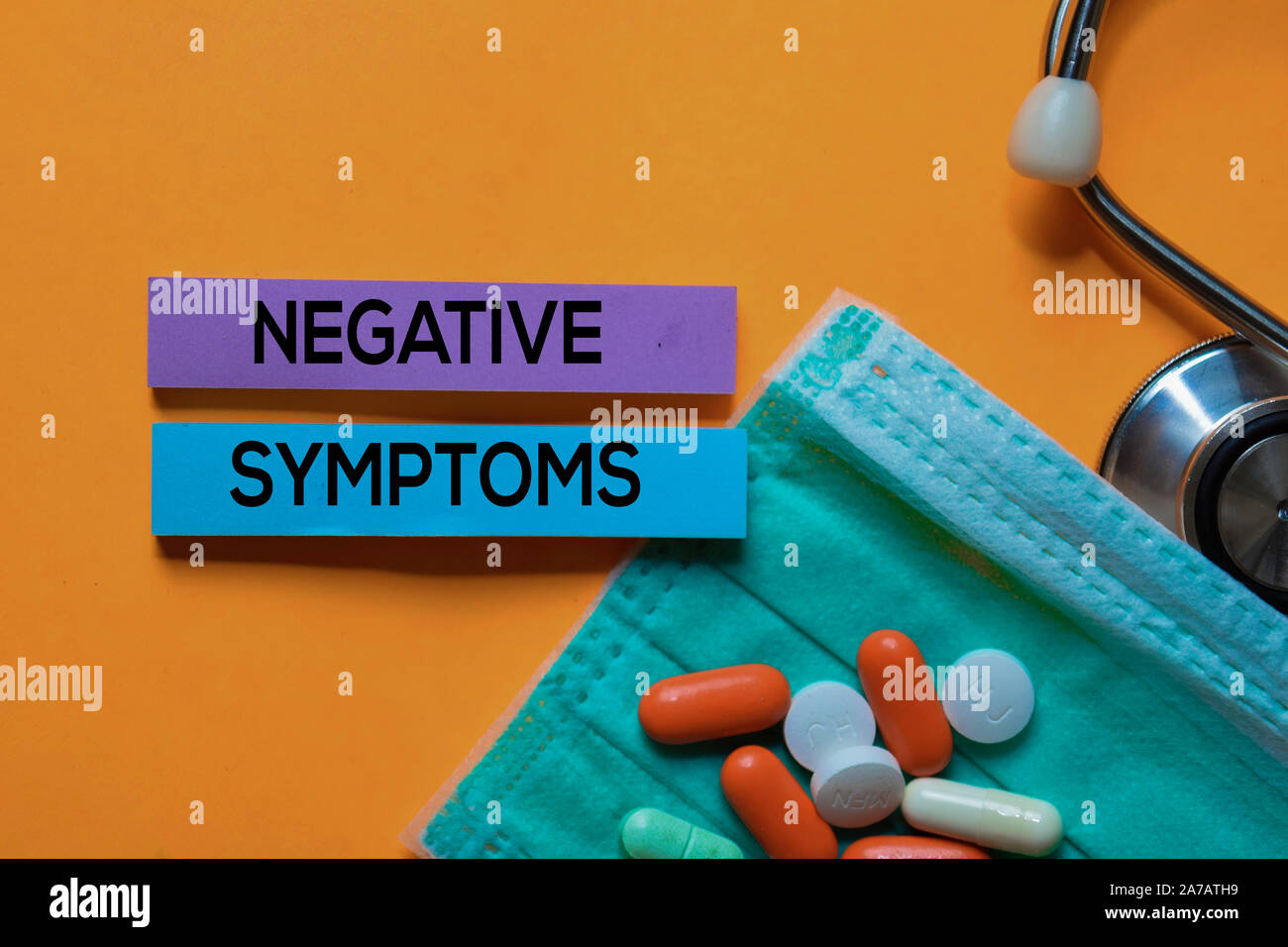 Negative Symptoms text on sticky notes. Office desk background. Medical ...