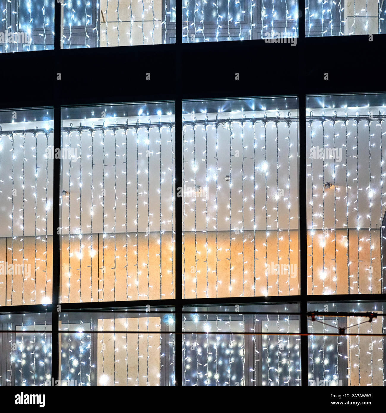 Fairy lights in a big window Stock Photo - Alamy