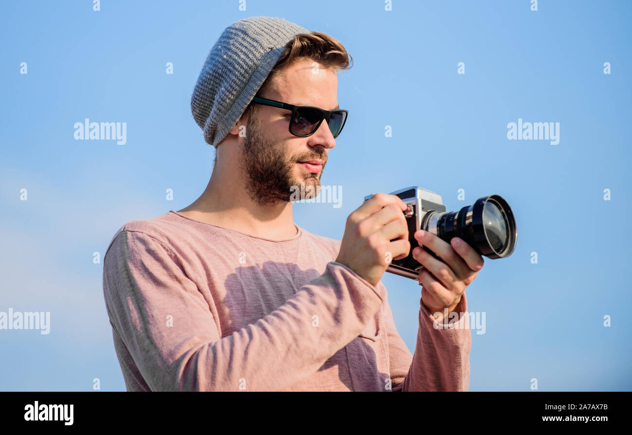 Professional photographer. Handsome photographer guy retro camera ...