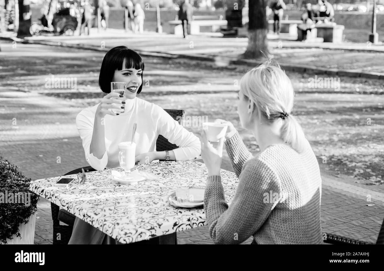 Conversation of two women cafe terrace. Friendship meeting ...