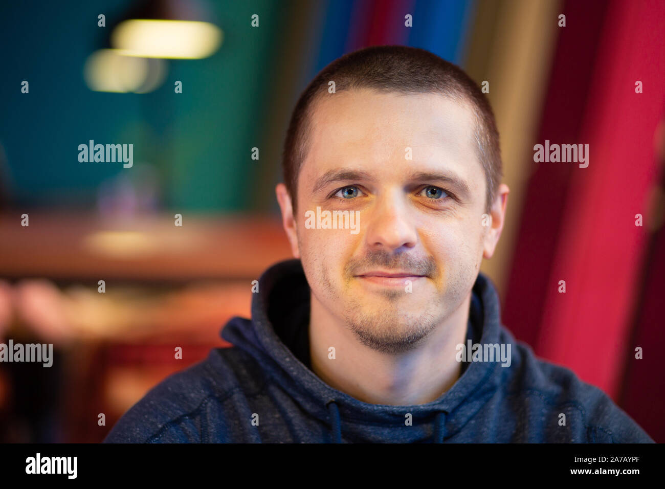 Happy young man in hoodie hi-res stock photography and images - Alamy
