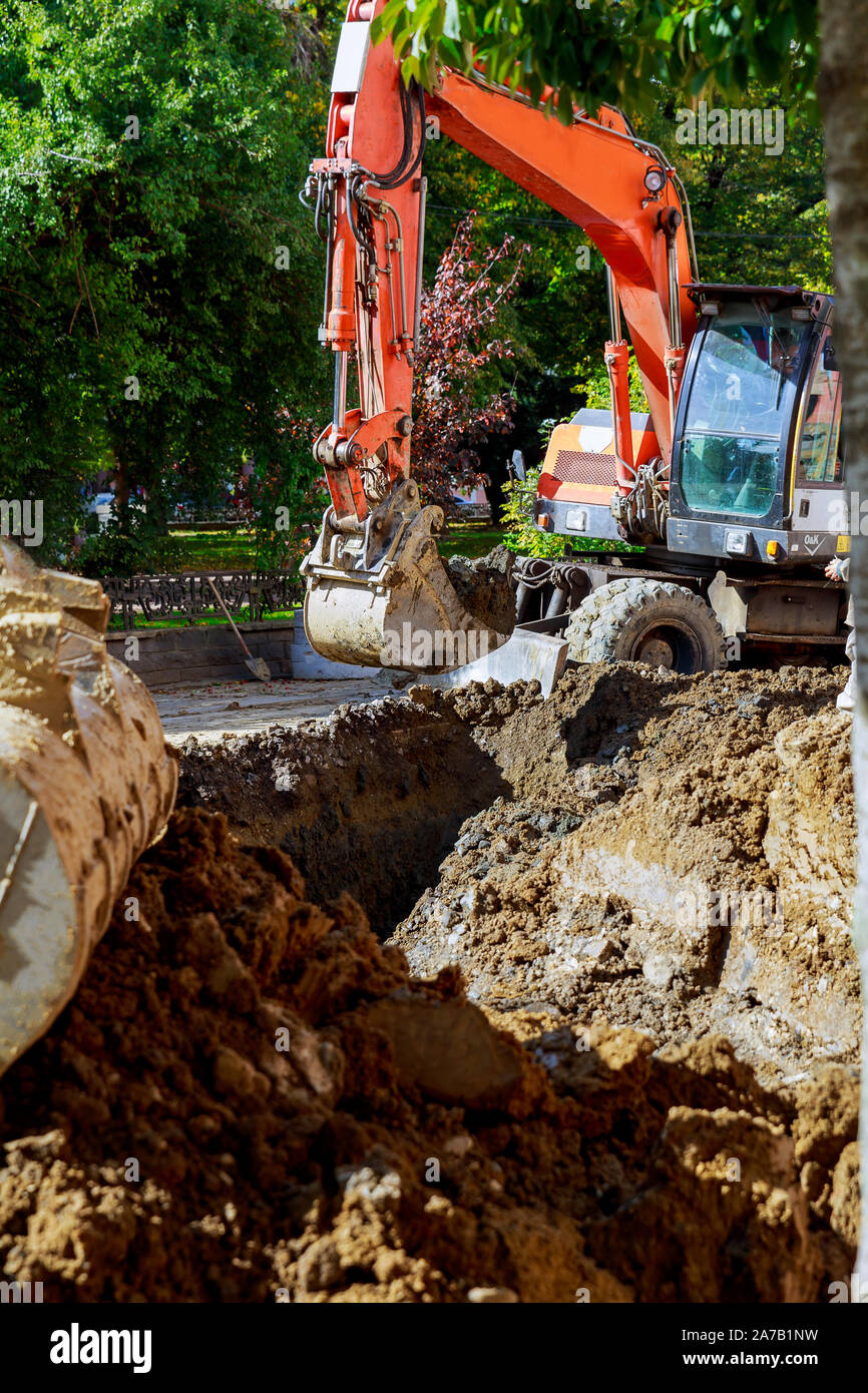 Outdoor work : Excavator digging to moving the soil in construction ...