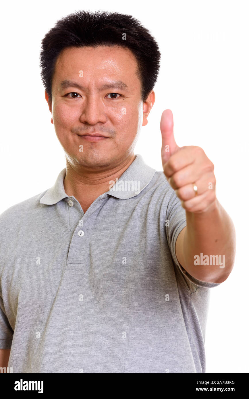 Studio shot of Japanese man isolated against white background Stock ...